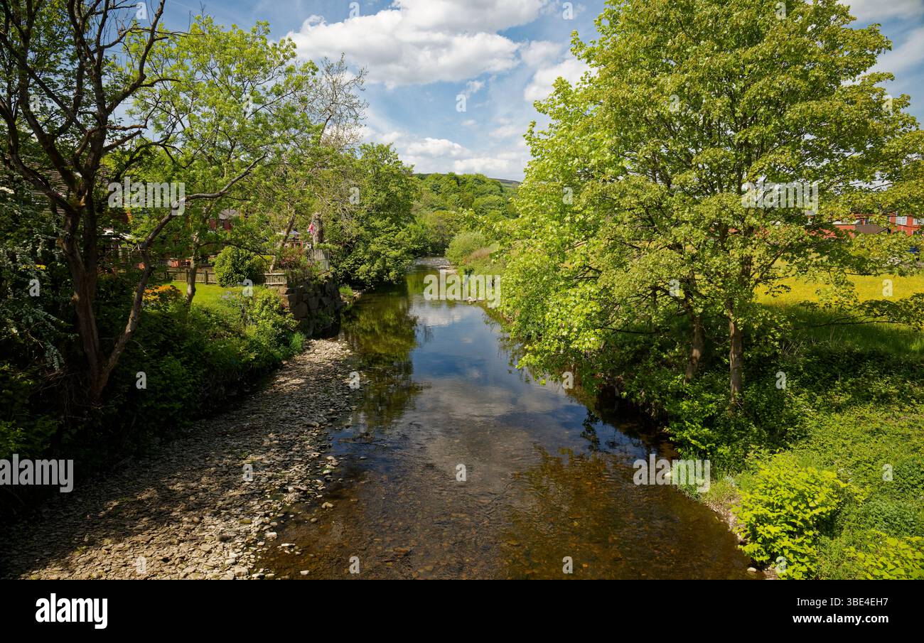 Blue river flows sunlit valley hi-res stock photography and images - Alamy