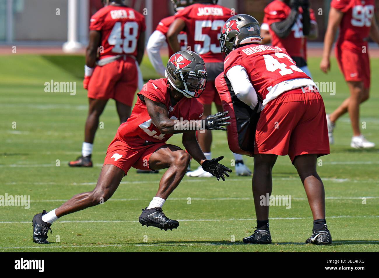 Tampa Bay Buccaneers cornerback Benjamin Morrison (21) cuts around ...
