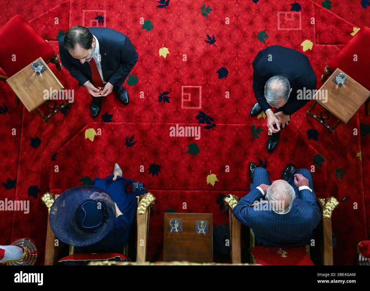 King Charles III speaks with Canadian Prime Minister Mark Carney (right ...