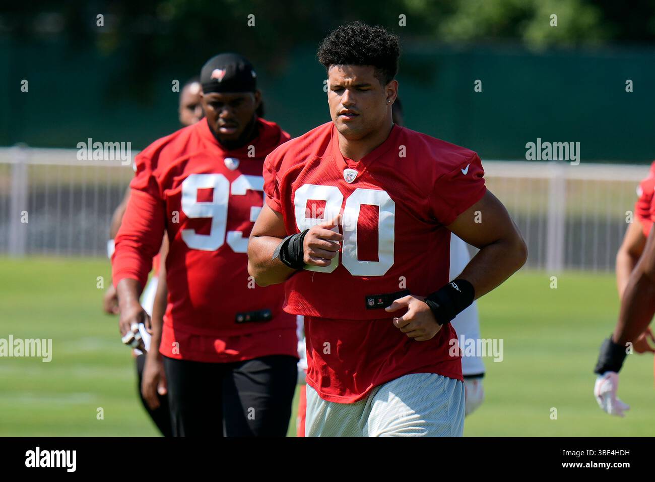 Tampa Bay Buccaneers defensive lineman Logan Hall (90) runs during an NFL football practice ...