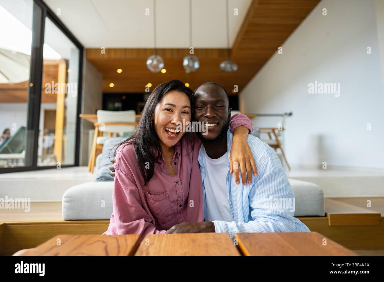 Happy diverse couple enjoying meaningful moments together, embracing ...