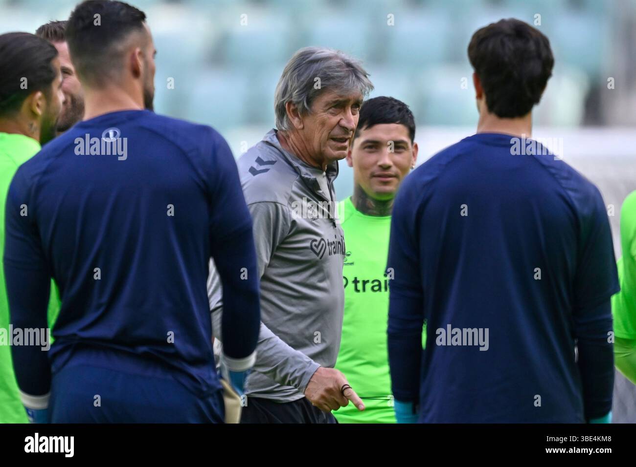 Betis' head coach Manuel Pellegrini gives instructions during a ...