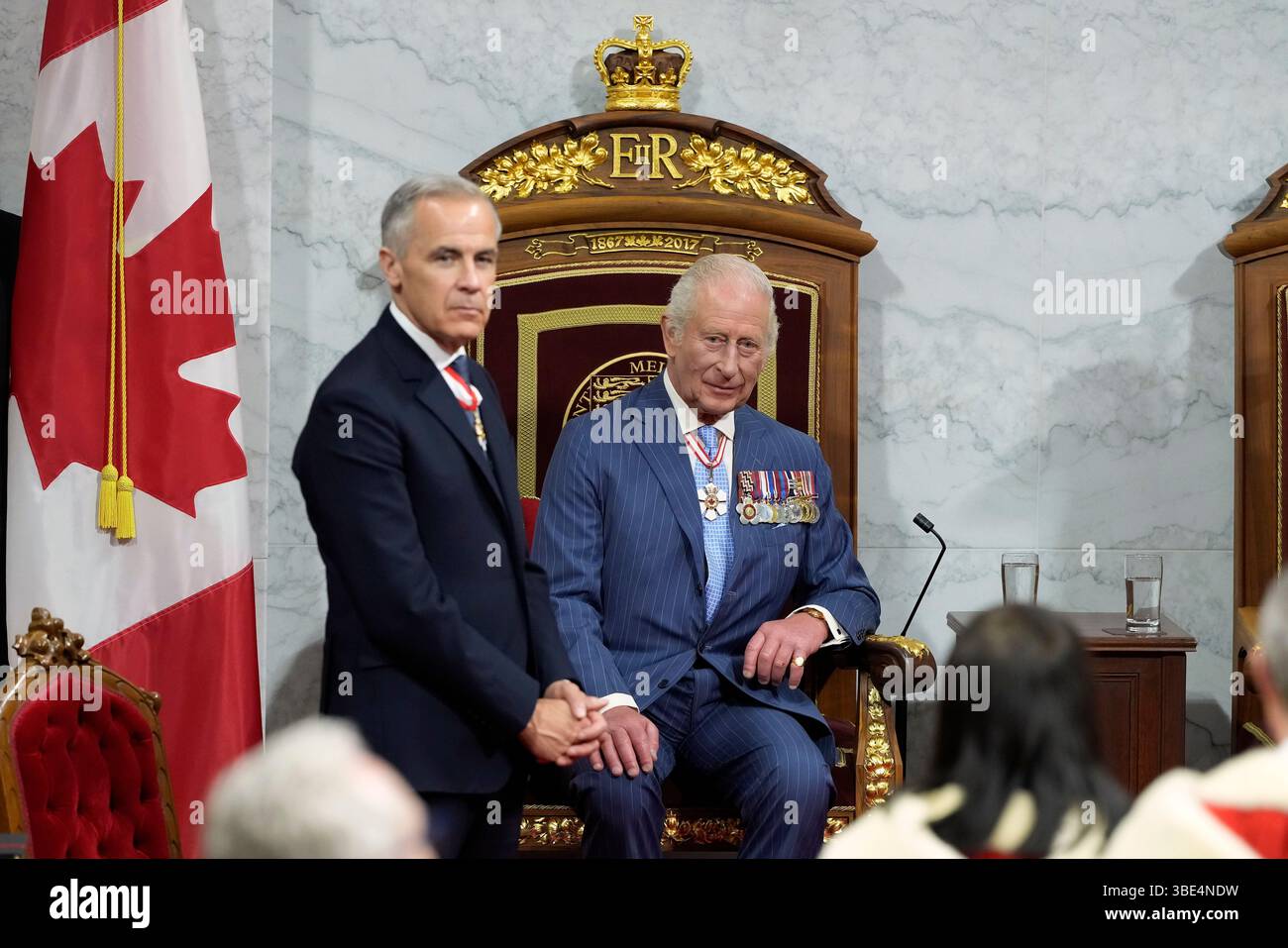 King Charles looks on after delivering the speech from the throne in the Senate in Ottawa ...