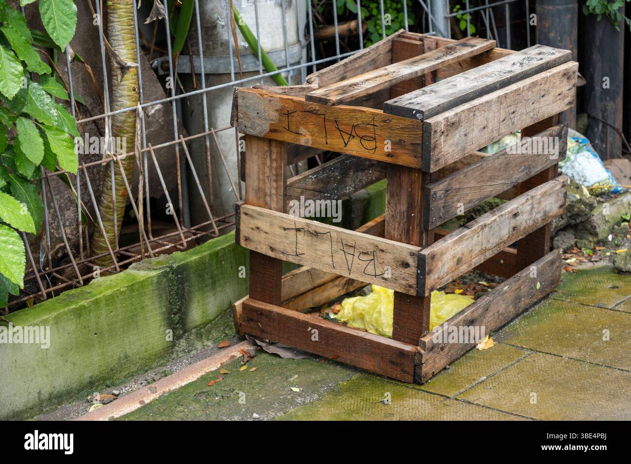 Wooden crate with the number 1891 written on it. The crate is sitting ...