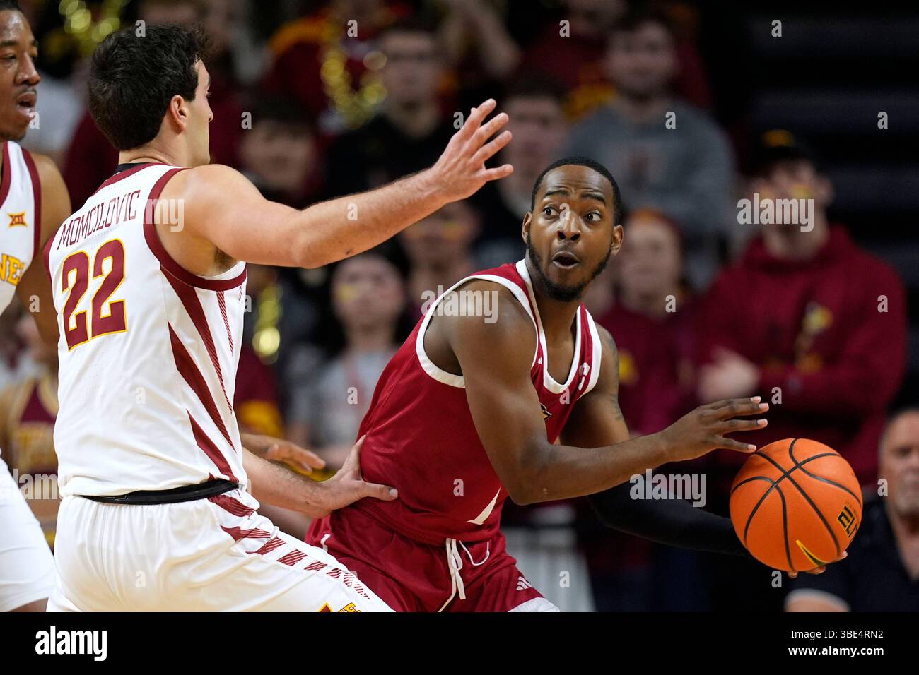 FILE - IU Indianapolis guard Alec Millender, right, looks to pass ...