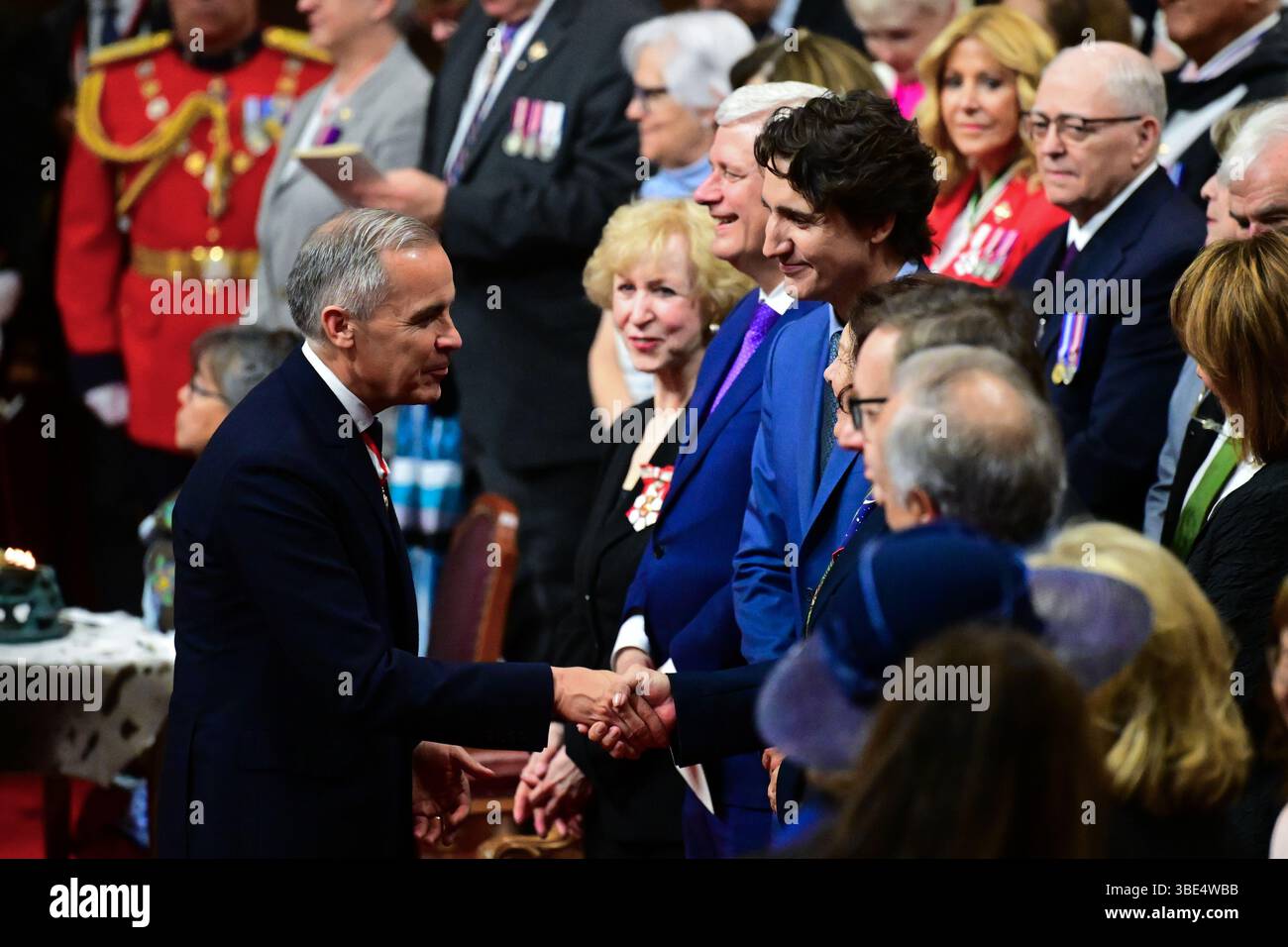 Canada Prime Minister Mark Carney speaks with former Prime Minister of ...