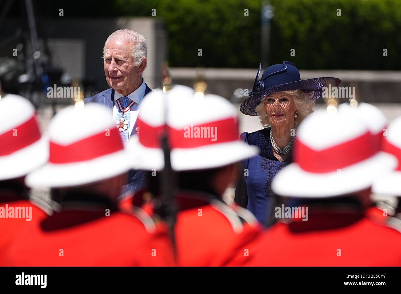 King Charles III and Queen Camilla lay a wreath at the Tomb of the ...