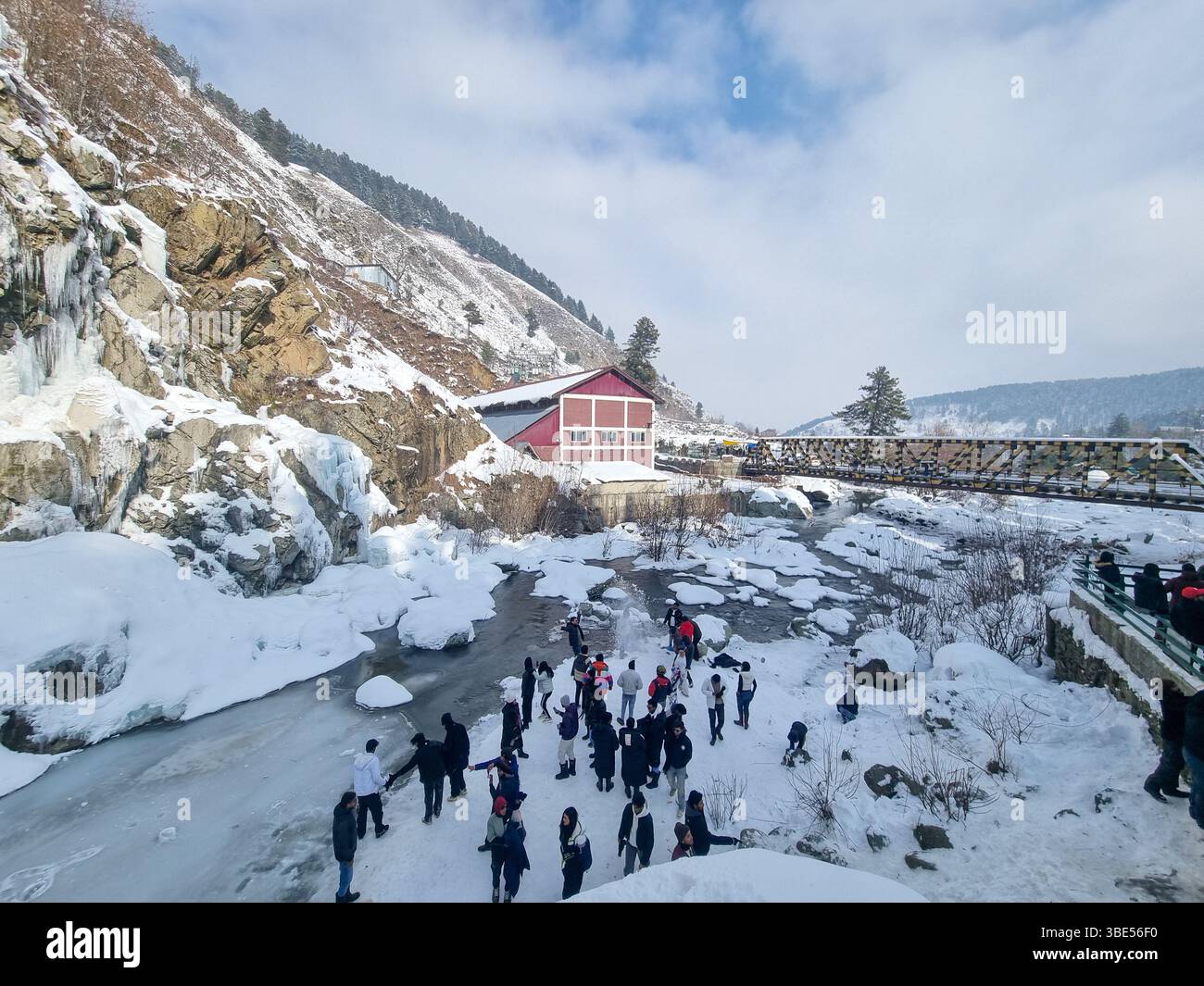Crowd of people enjoying frozen Drung waterfall in Tanmarg Gulmarg ...