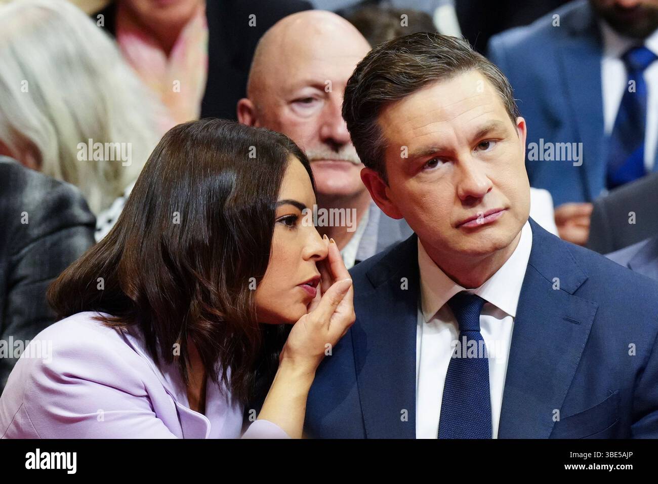 Conservative Leader Pierre Poilievre sits with his wife Anaida ...