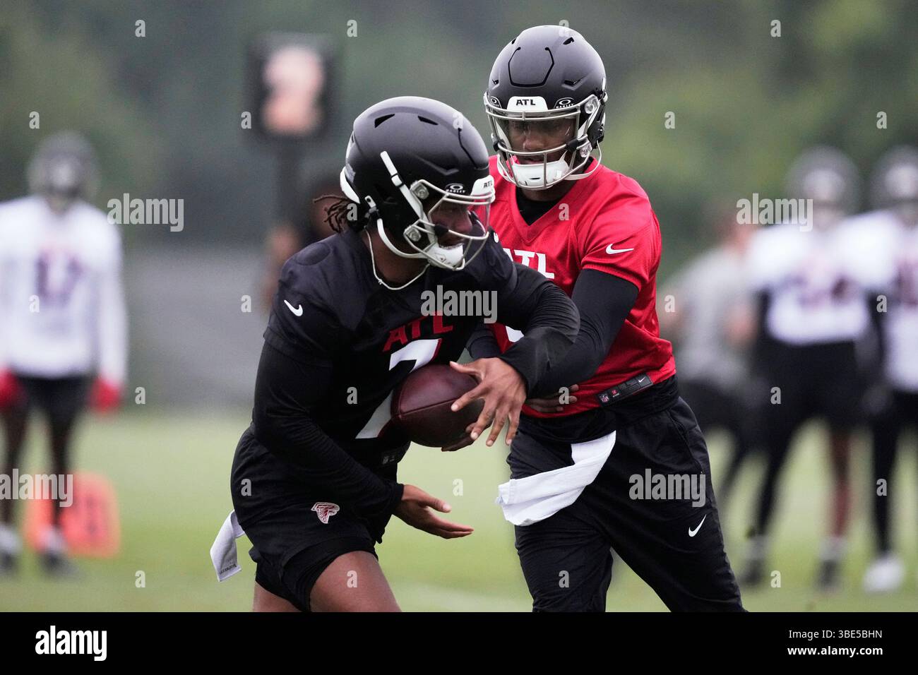 Atlanta Falcons running back Bijan Robinson (7) and quarterback Michael ...