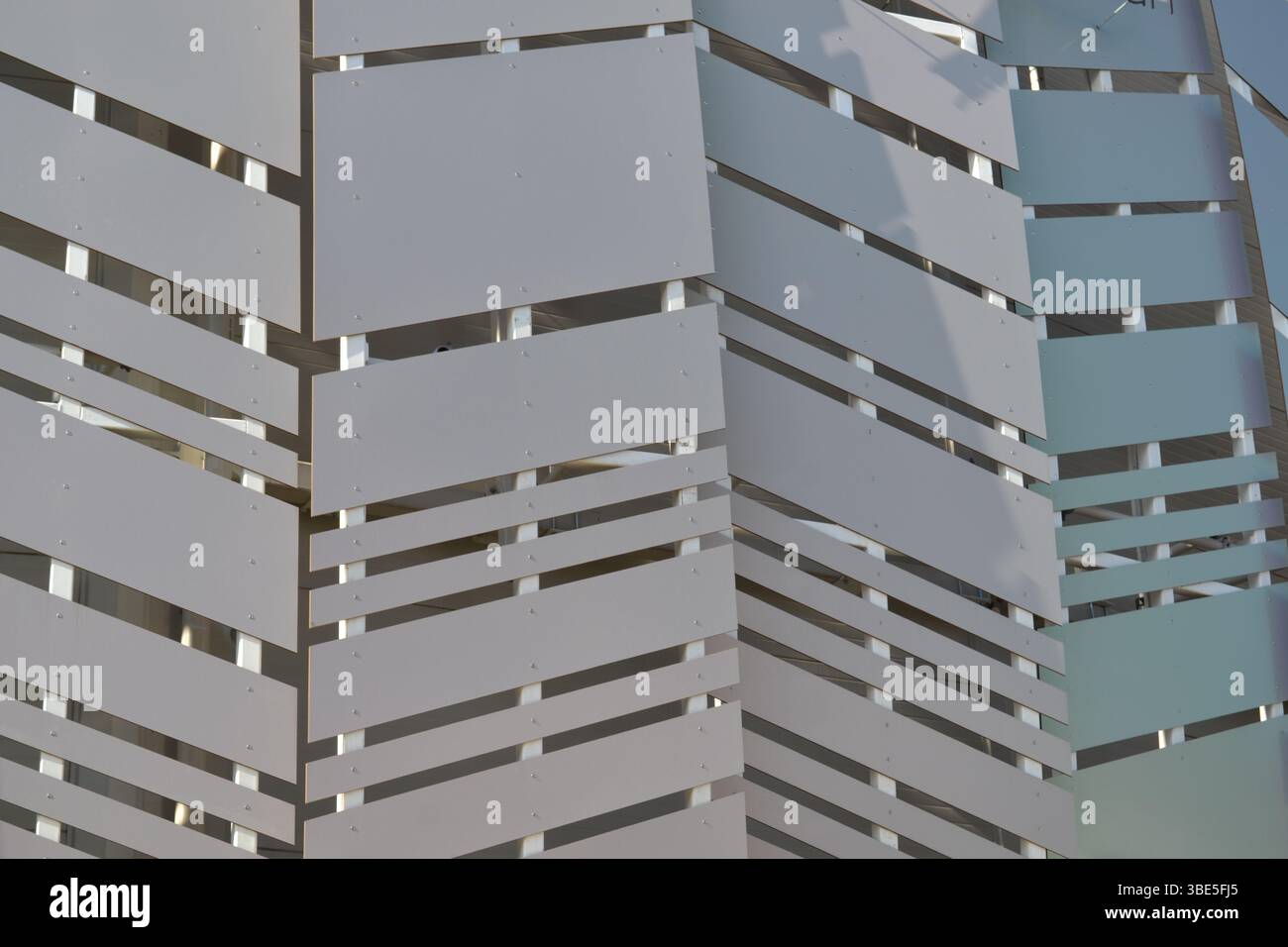 Abstract of energy saving building facade with silver colored boards of ...