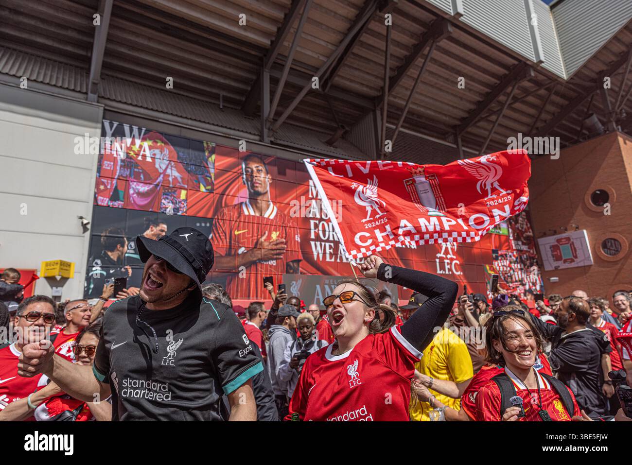 Liverpool fans celebrate winning the Premier League title outside ...