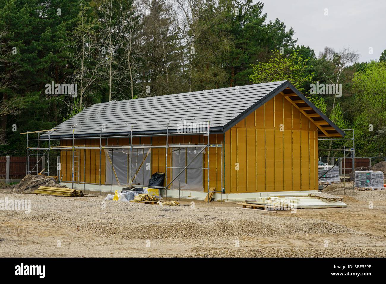 Modern Wooden House Under Construction Near Forest, Sustainable ...
