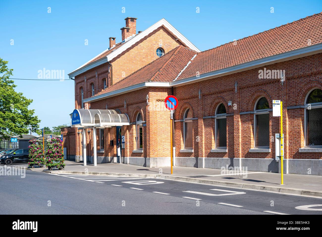 Railroad station of Beveren Waas in orange brick stone in Beveren, East ...
