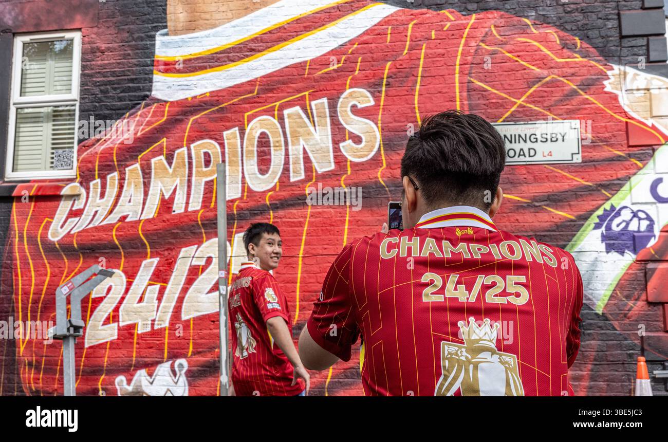 Liverpool fans take photos of the new Virgil van Dijk mural near ...