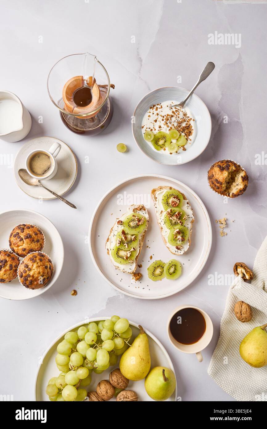 Delicious kiwi toast topped with creamy cheese, crunchy walnuts, and ...