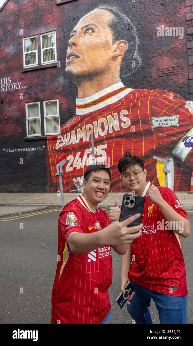 Liverpool fans take photos of the new Virgil van Dijk mural near ...