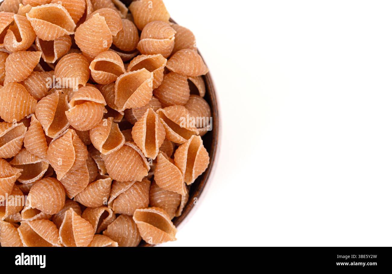 Whole Wheat Shell Pasta on a White Background Stock Photo - Alamy