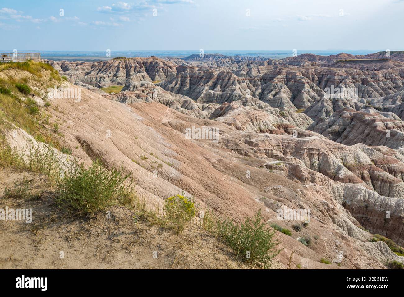 Erosion exposes colorful layers of sedimentary rock in the Badlands ...