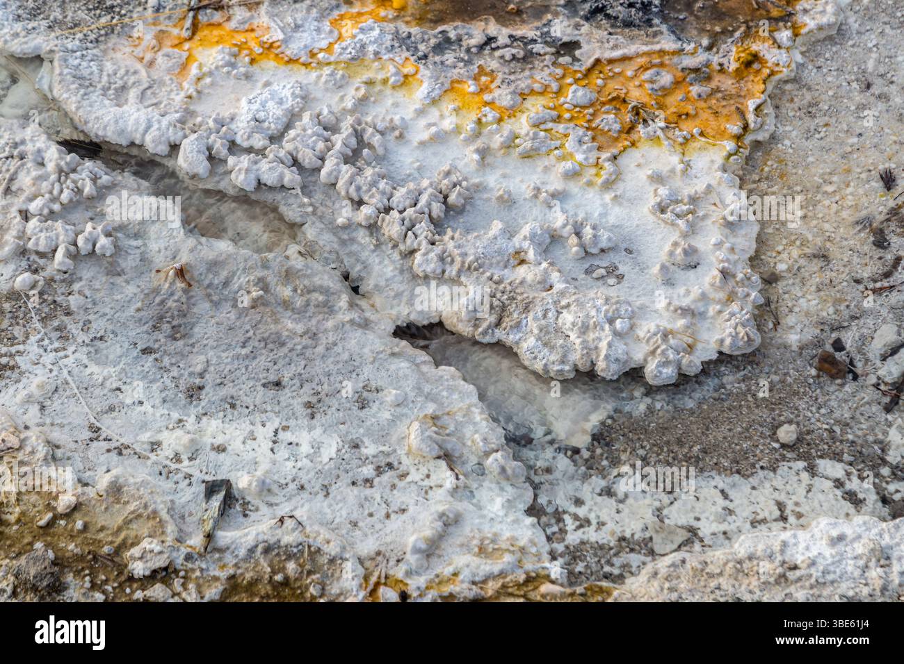 Close up of mineral deposits on the perimeter of a geyser in the Upper ...