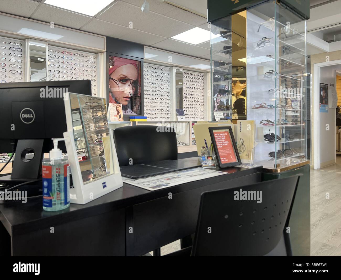 USA. 08th Aug, 2024. Interior of an optical store featuring display ...