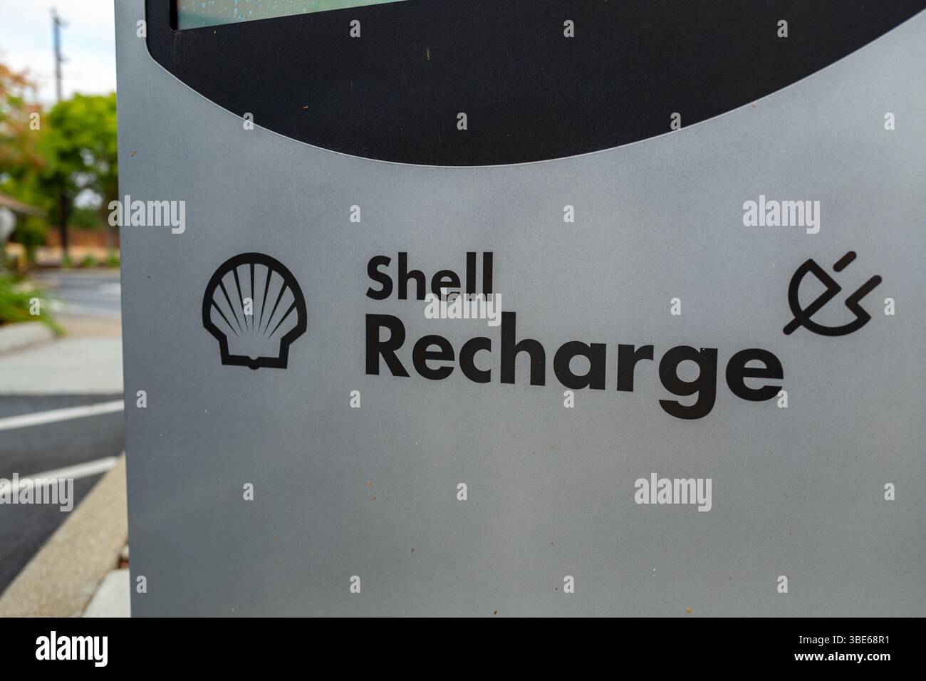 Close-up of Shell Recharge electric vehicle charging station with logo ...