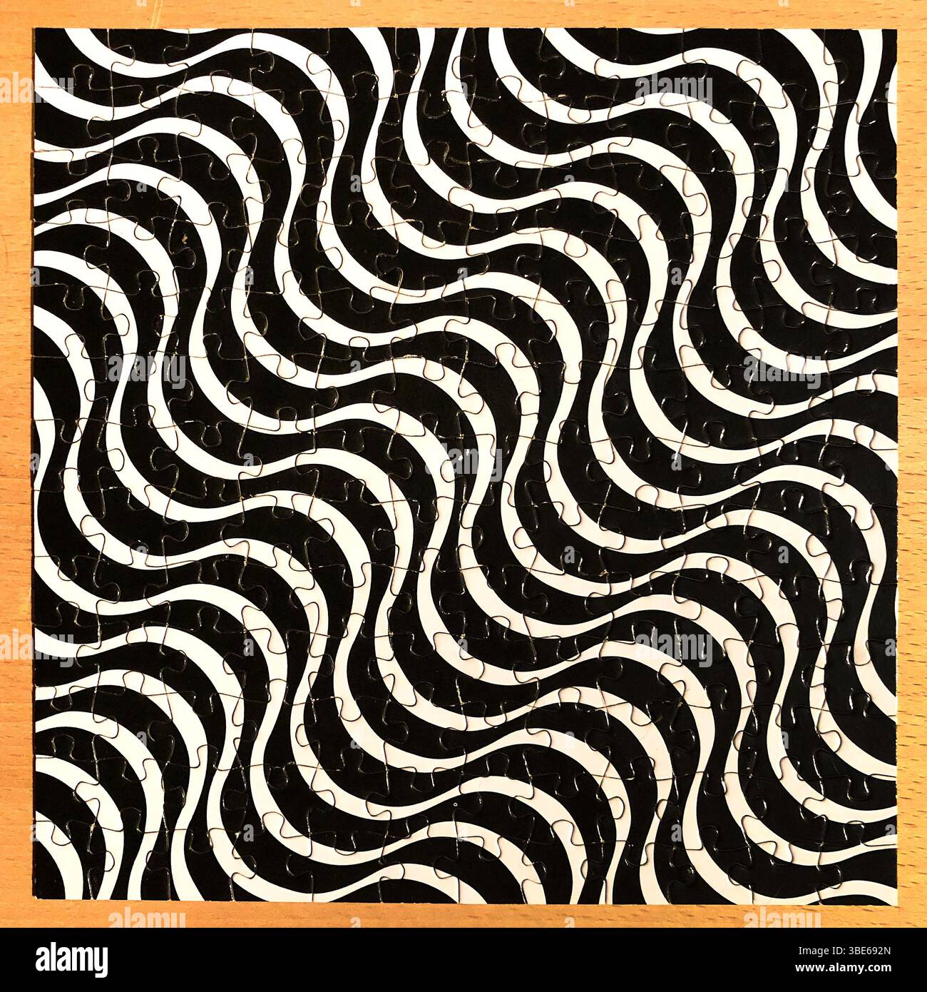 Completed 150-plus piece "Op Art" jigsaw in the style of British artist Bridget Riley Stock ...