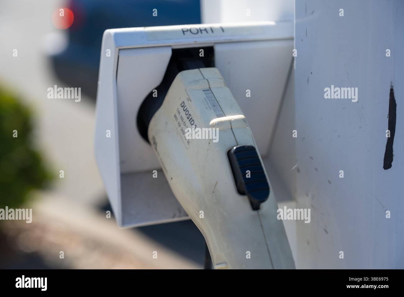 USA. 20th Aug, 2024. Close-up of an electric vehicle charging plug ...