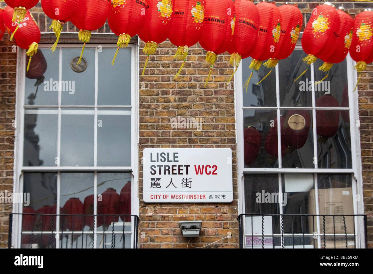 Red lanterns adorn Lisle Street in London's Chinatown, showcasing ...