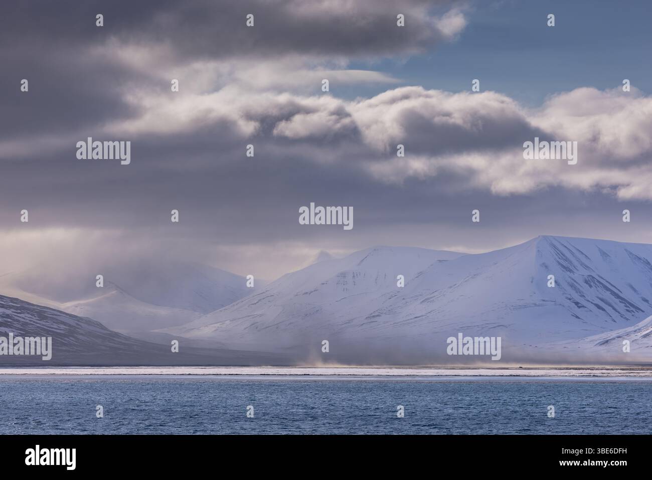 Fjord under dramatic moving clouds hi-res stock photography and images ...