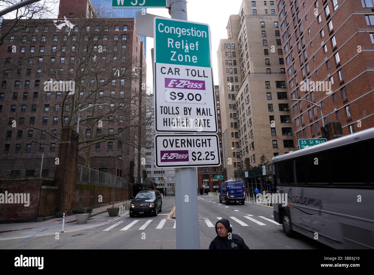 FILE - Signs advising drivers of congestion pricing tolls are displayed ...