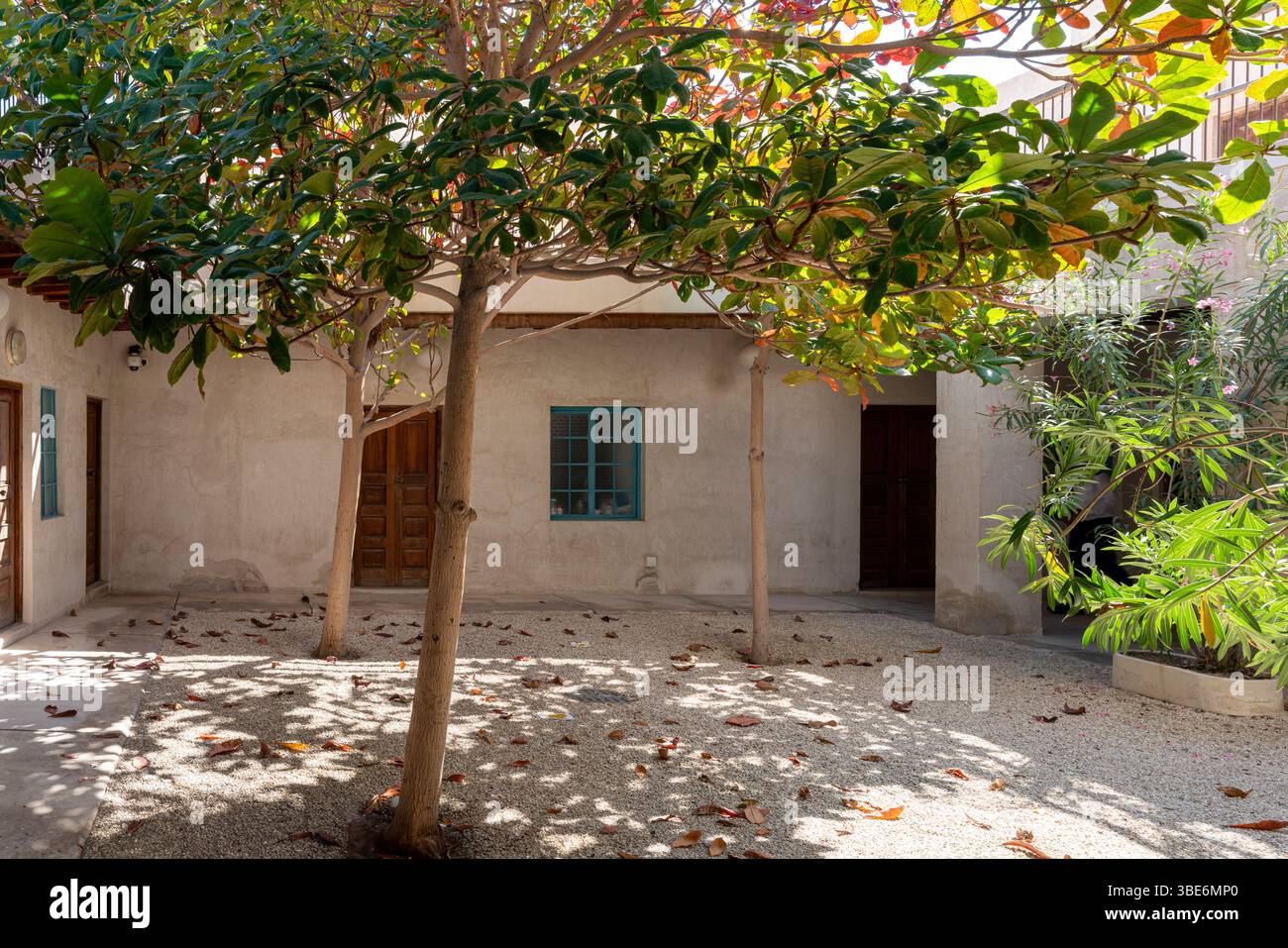 Serene courtyard white buildings hi-res stock photography and images ...