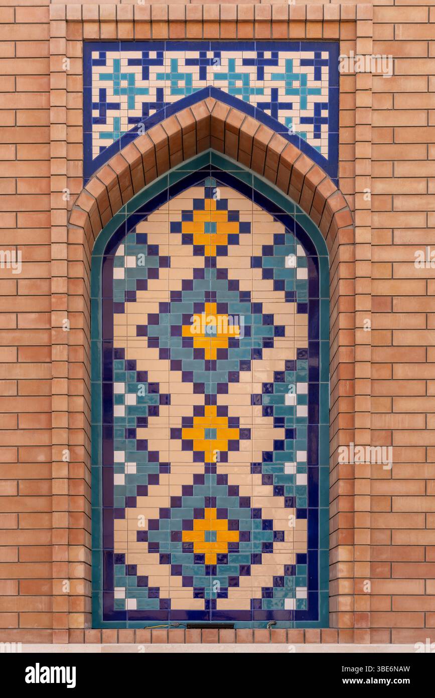 Geometric diamond patterns in blue and gold tiles create stunning ...