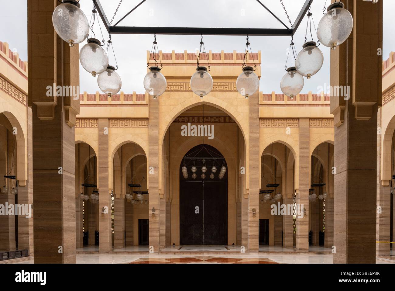 Elegant courtyard of Al Fateh Grand Mosque in Manama displays classical ...