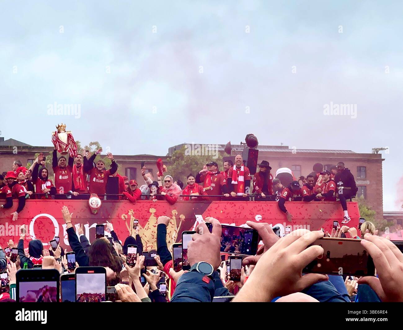 Liverpool FC players celebrate on the open-top bus with the Premier ...