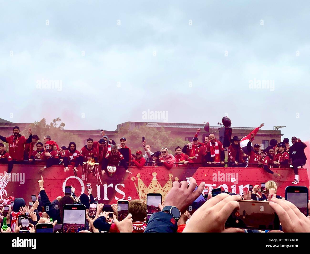 Liverpool FC players celebrate on the open-top bus with the Premier ...
