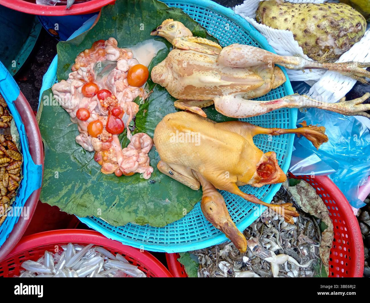 Assortment chicken and unlaid eggs at Kandal Market or Phsar Kandal is ...
