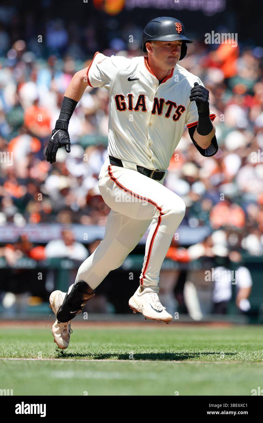 Tyler Fitzgerald #49 of the San Francisco Giants runs up the line on a ...