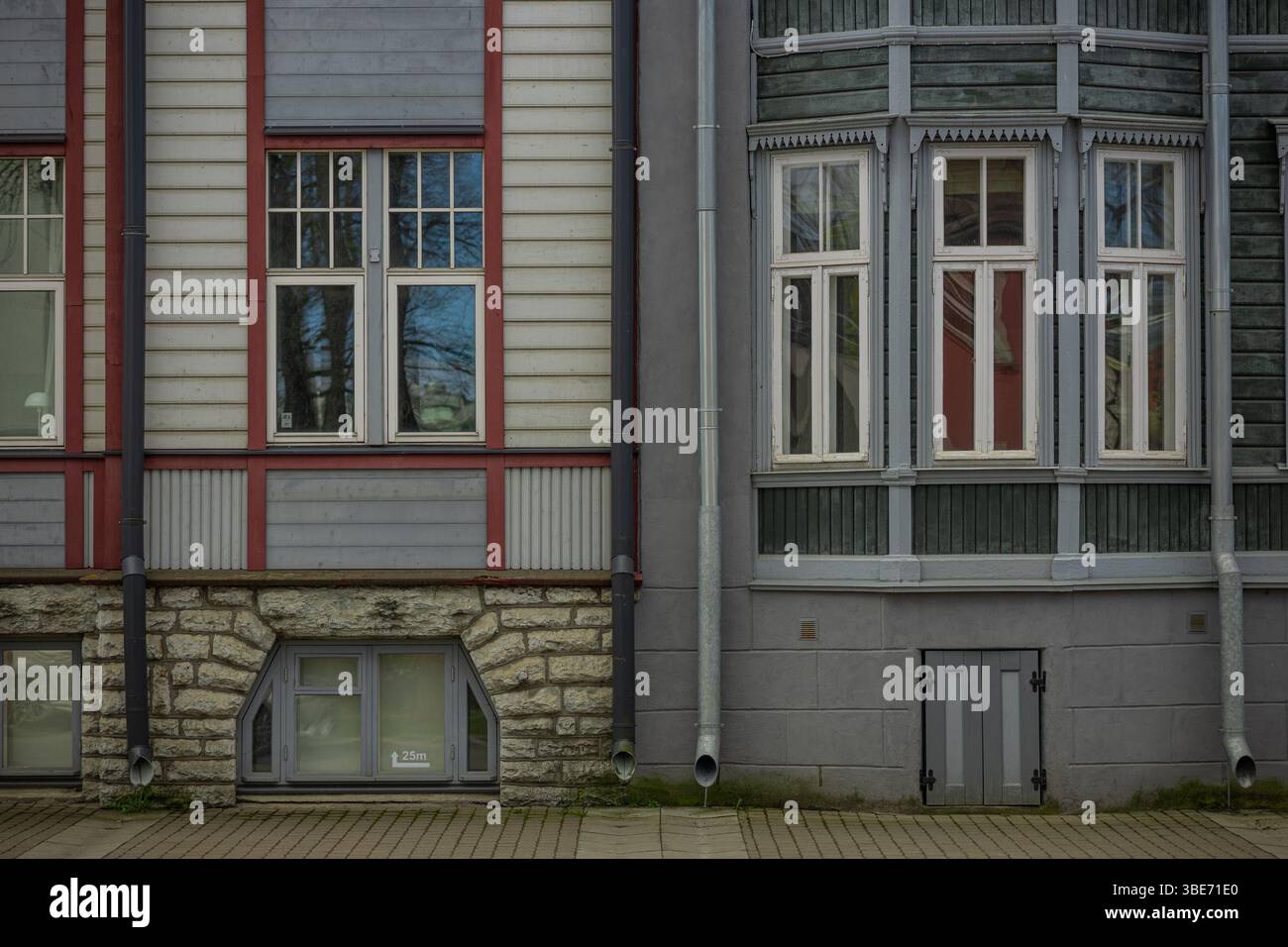 The image shows two adjacent buildings in Tallinn with distinct ...
