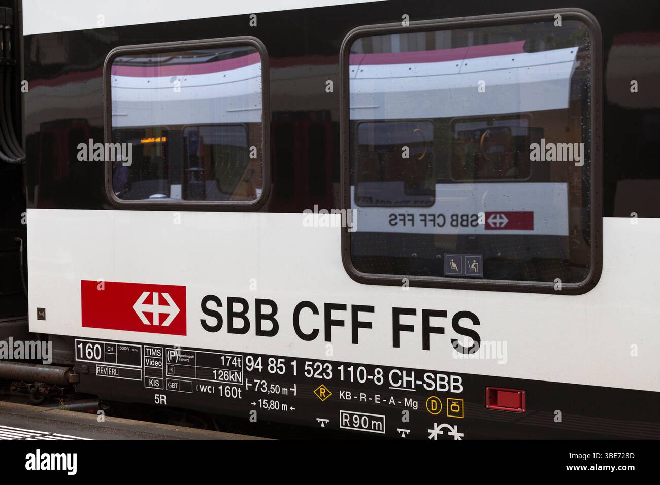 Swiss federal railways ( SBB CFF FFS ) logo and reflection on a Swiss ...