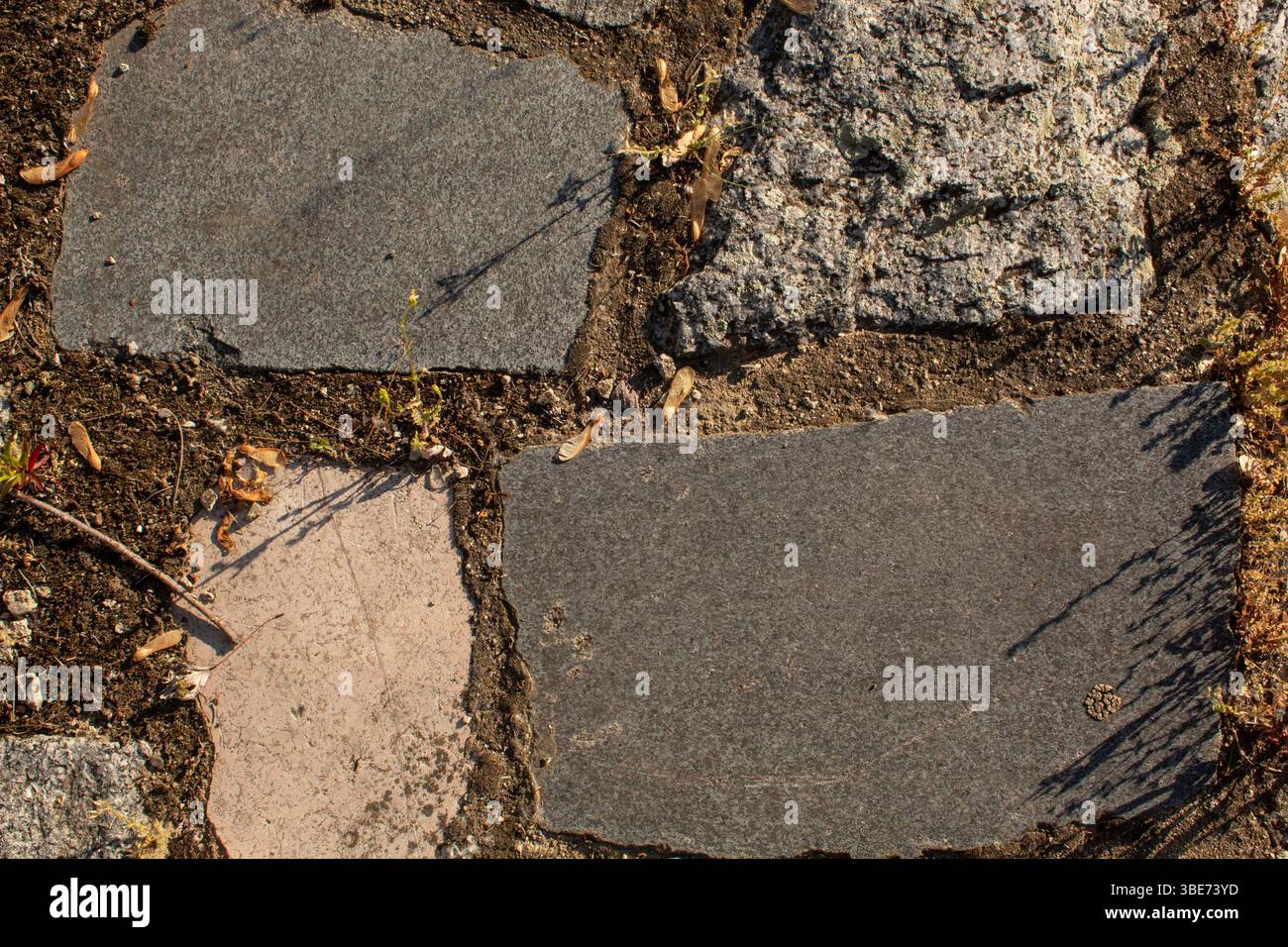 Stone cubes with concrete on the ground. Flat lay Stock Photo - Alamy