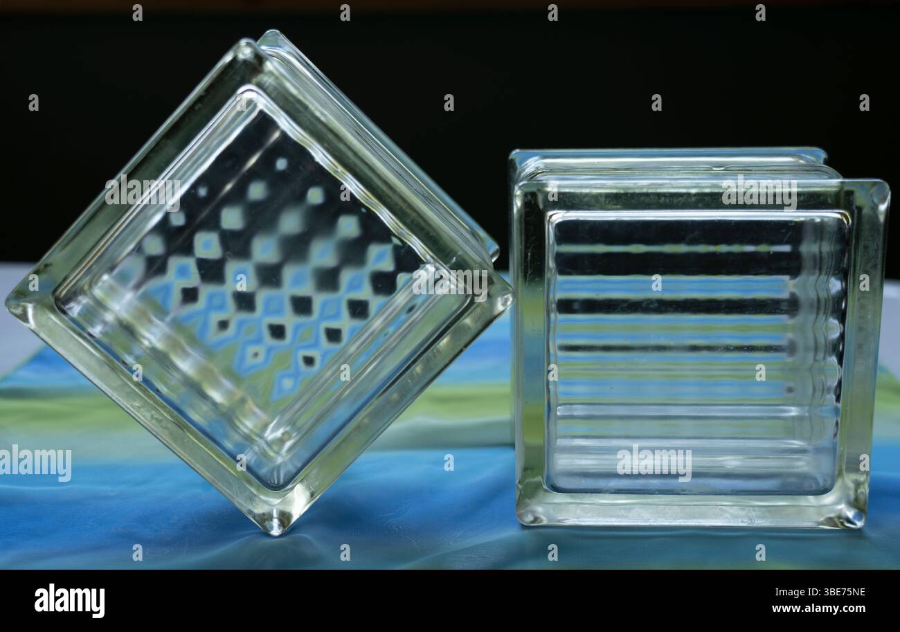 Light refraction on two glass building blocks used for windows or walls ...