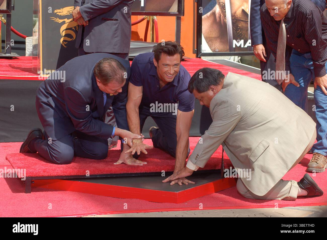 Hugh Jackman makes impressions of his hands at his hand and footprint ...