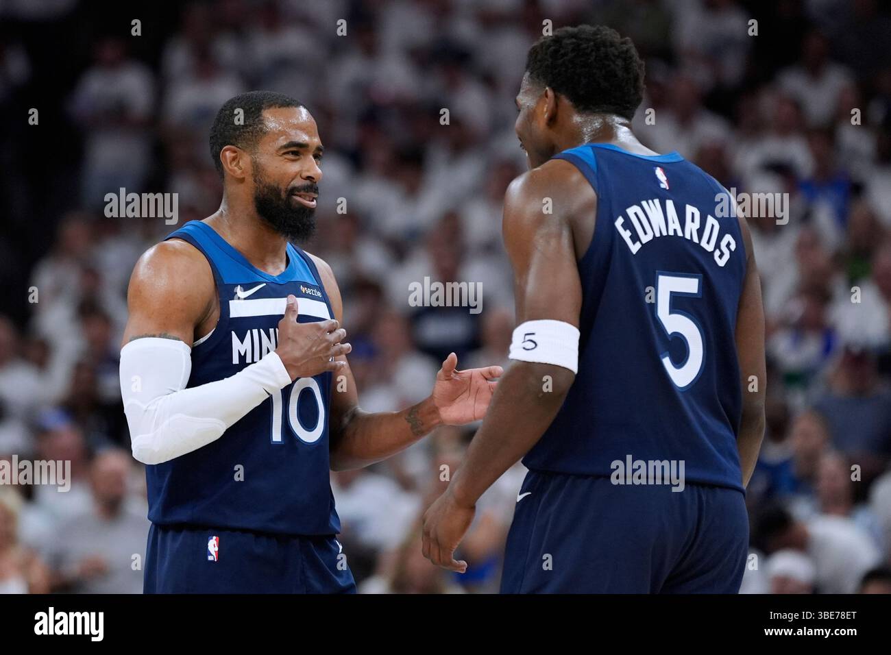 Minnesota Timberwolves guards Mike Conley (10) and Anthony Edwards (5 ...