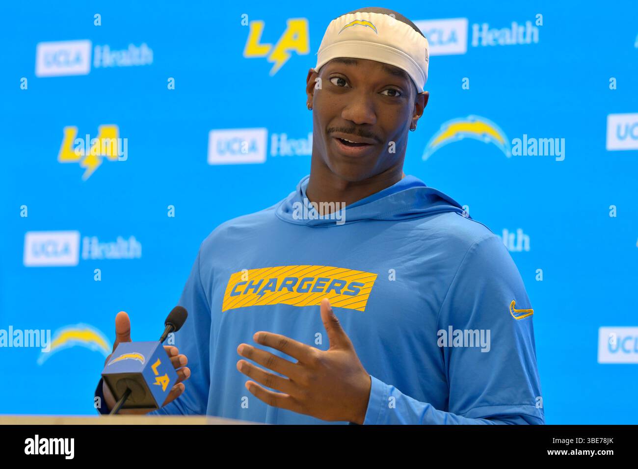 Los Angeles Chargers cornerback Cam Hart talks to the media at a press ...