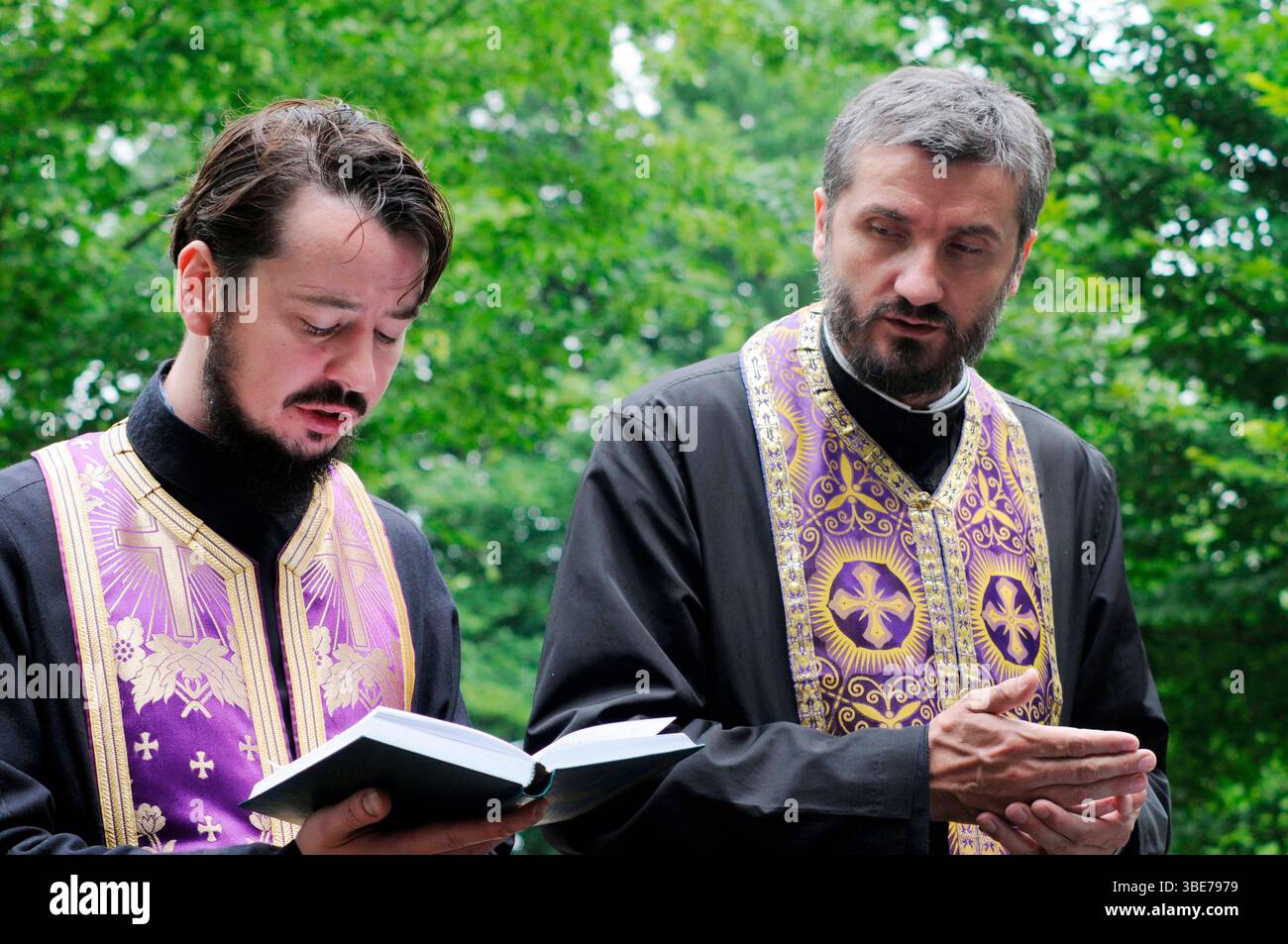 priest of the eastern orthodox church during a religious ceremony ...
