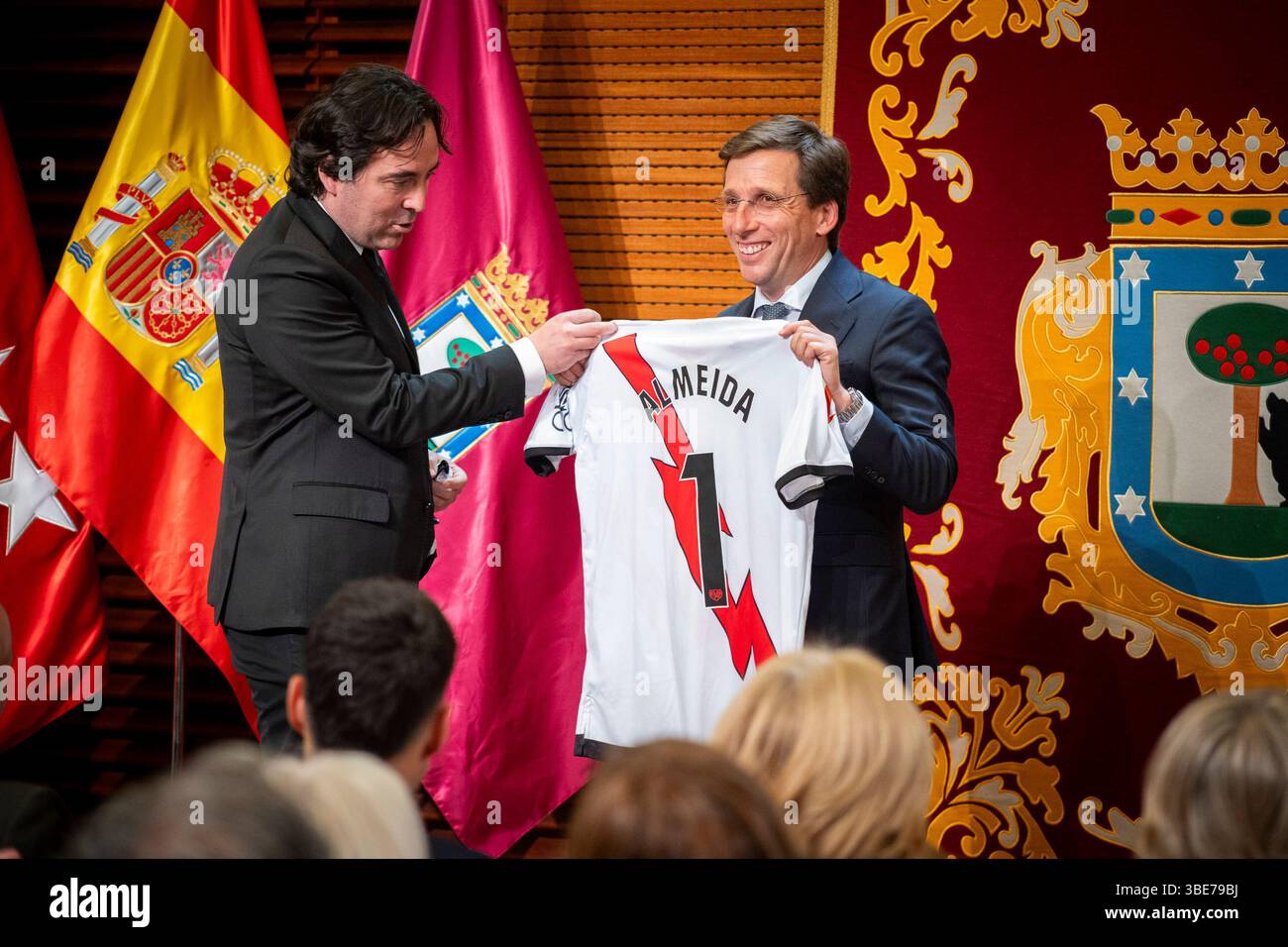 Raul Martin Presa gives a football jersey to Jose Luis Martinez-Almeida ...