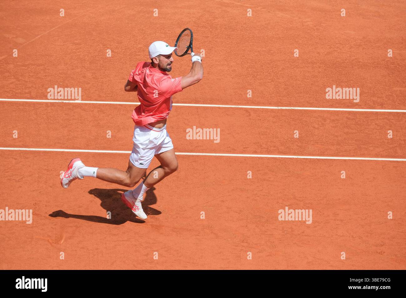 Novak Djokovic of Serbia in action against Matteo Arnaldi the Mutua Madrid Open at La Caja ...