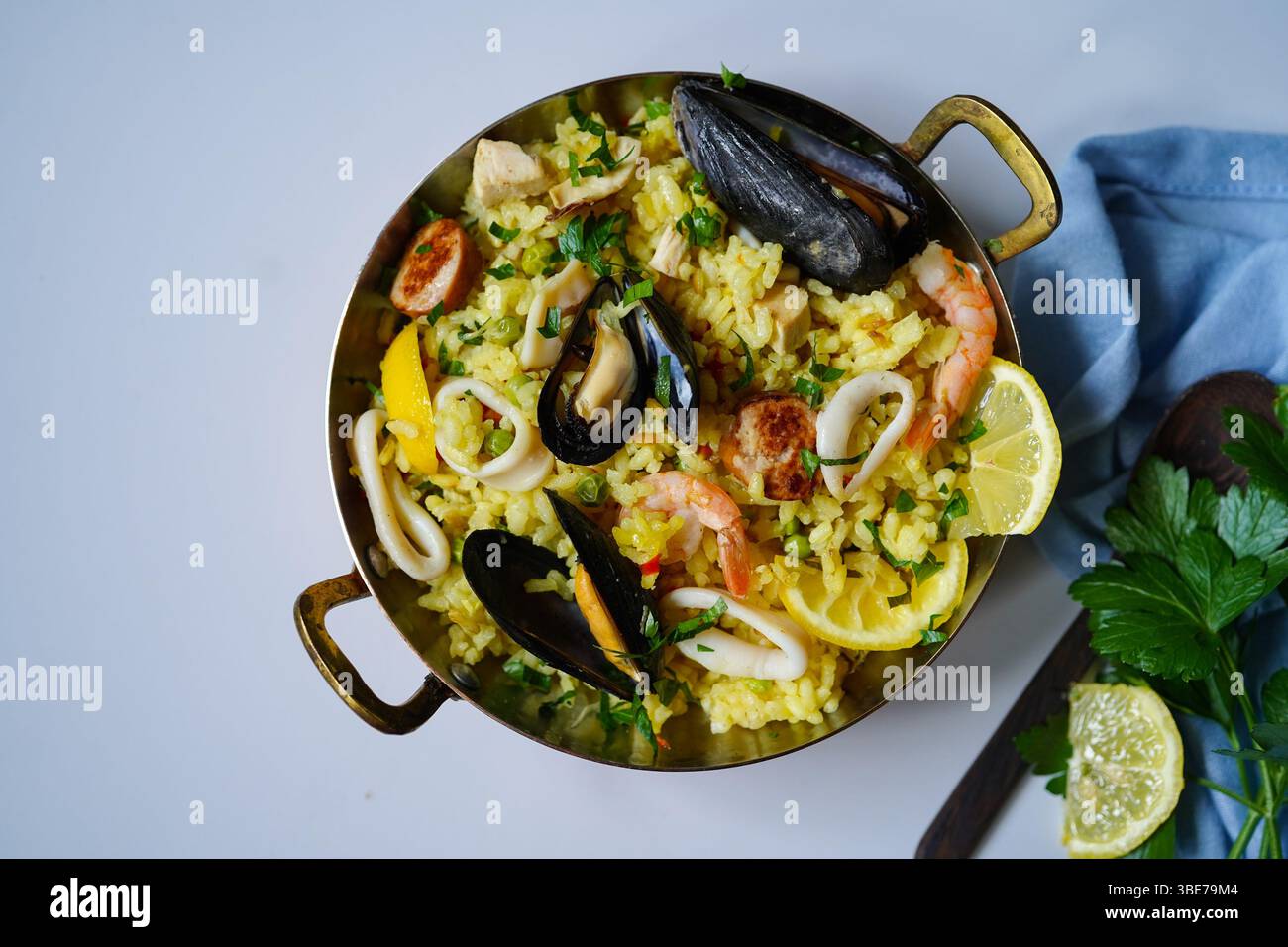 Homemade Seafood Paella rice with shrimps,peas,mussels, calamari Stock ...