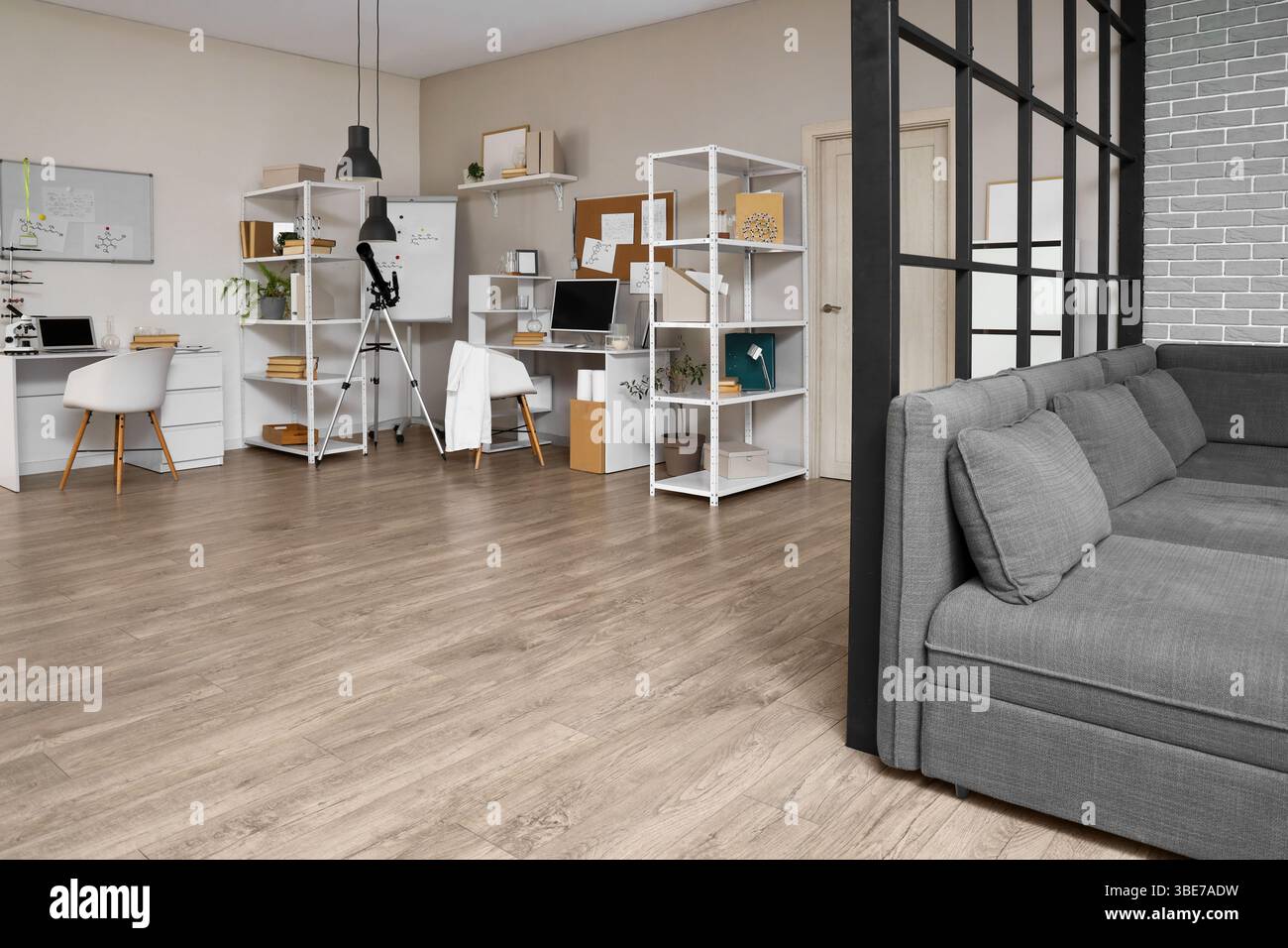 Interior of medical laboratory with computer, telescope and scientific ...